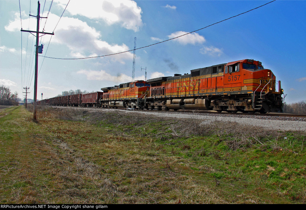 BNSF 5157 Leads a rock train Nb.